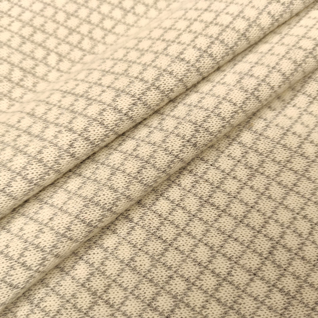 Tessuto jersey peso autunnale a fantasia motivo geometrico grigio ...
