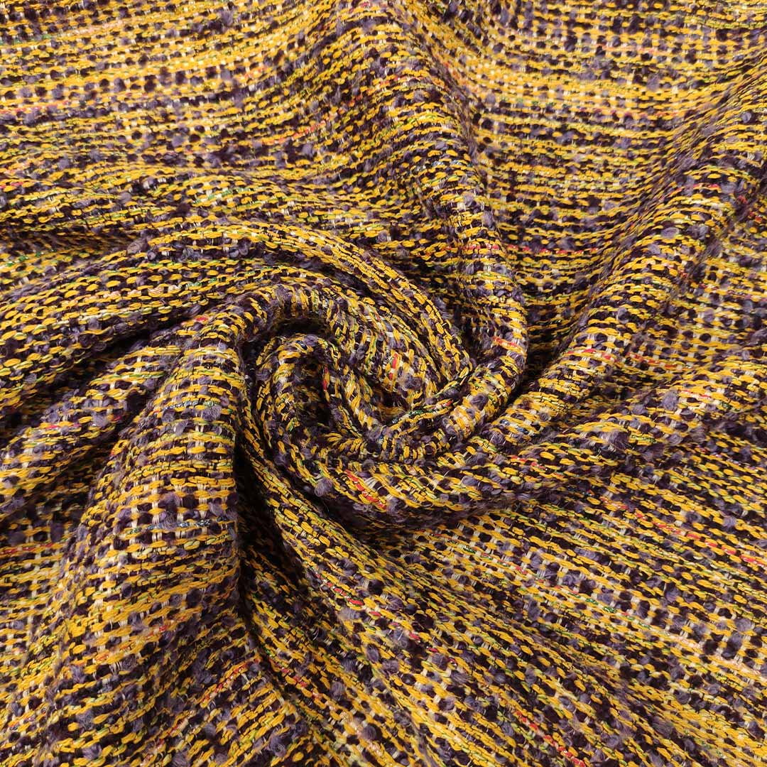 Tessuto Tweed Bouclé in lana giallo - viola - Iaiatessuti