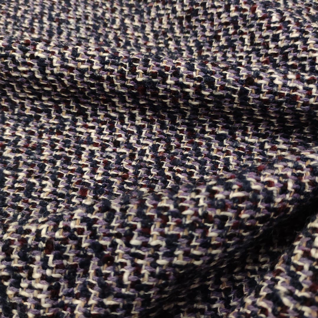Tessuto Tweed Bouclé in lana lilla - viola - blu - bianco - Iaiatessuti
